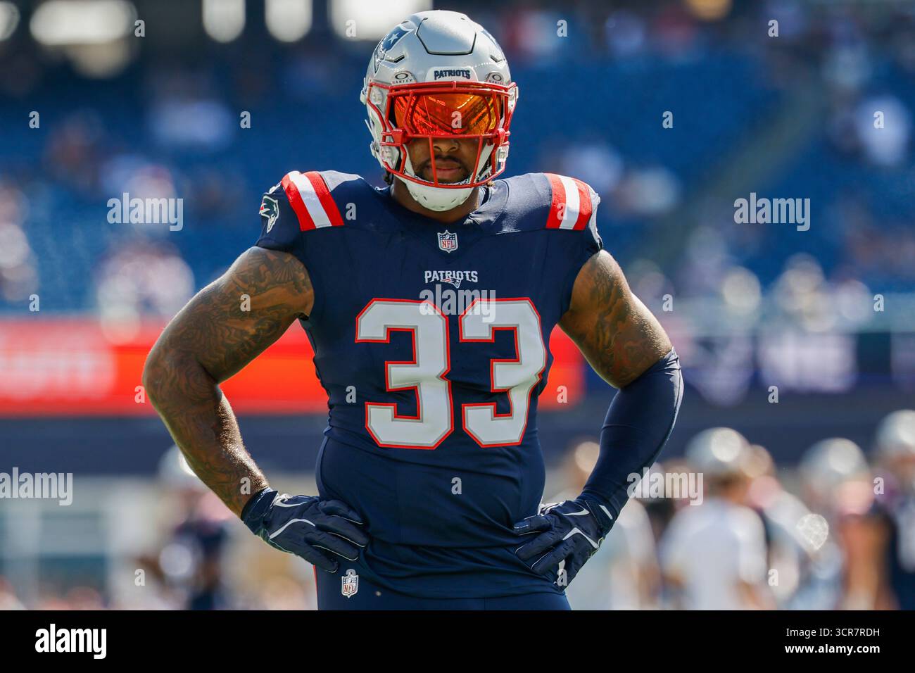 New England Patriots linebacker Anfernee Jennings (33) warms up prior ...