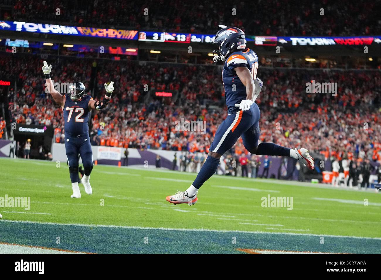 Denver Broncos wide receiver Marvin Mims Jr. (19) runs for a touchdown against the Cincinnati ...