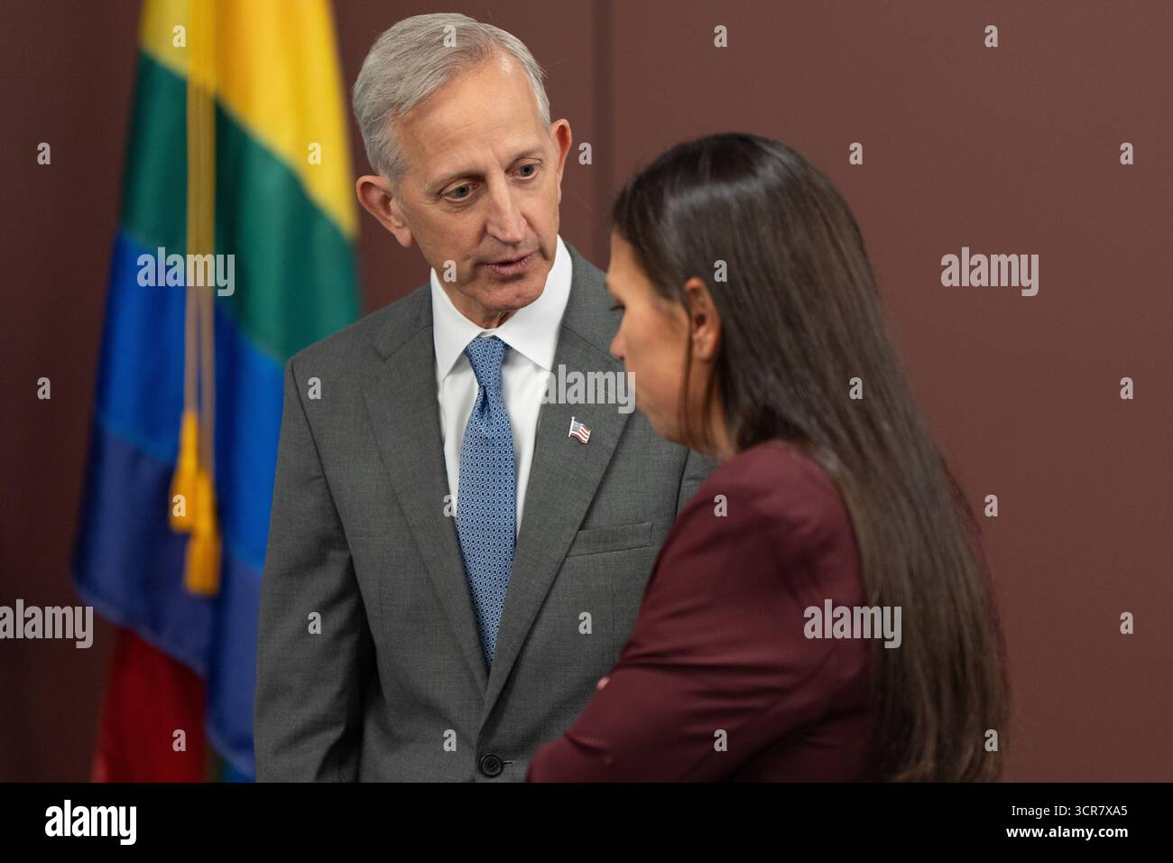Portland Mayor Keith Wilson speaks Lacey Beaty, mayor of Beaverton, Ore., after a news ...