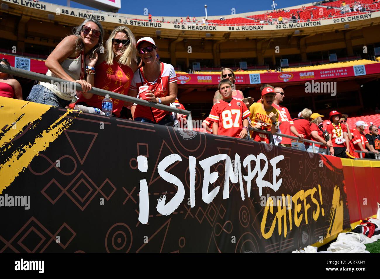 Kansas City Chiefs fans gather over a banner celebrating Hispanic ...