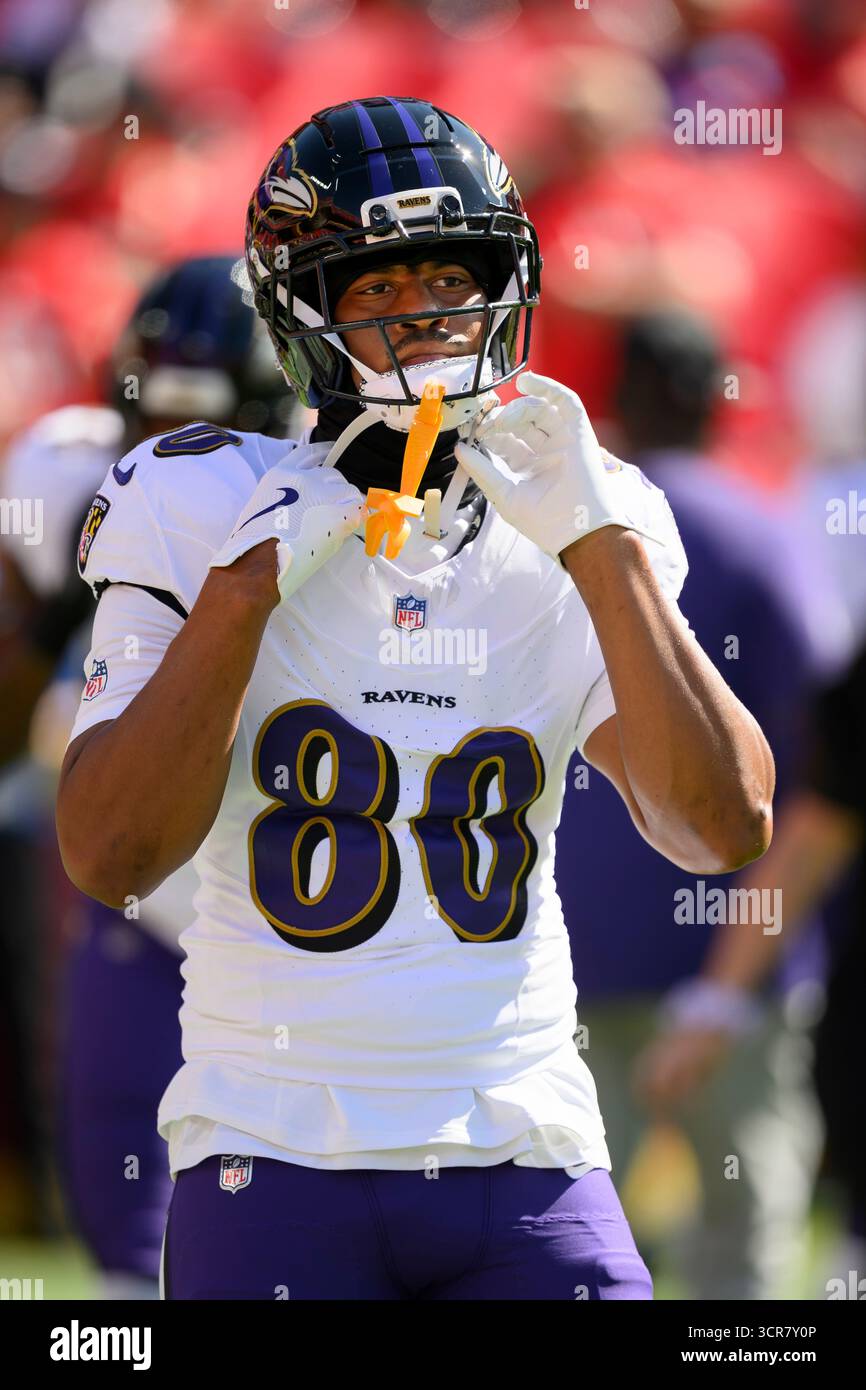 Baltimore Ravens tight end Isaiah Likely adjusts his helmet during ...
