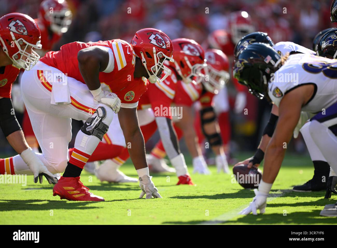 Kansas City Chiefs defensive end Chris Jones, with knee brace, and the ...