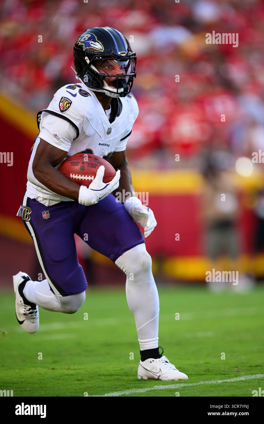 Baltimore Ravens running back Rasheen Ali runs a kickoff back against ...