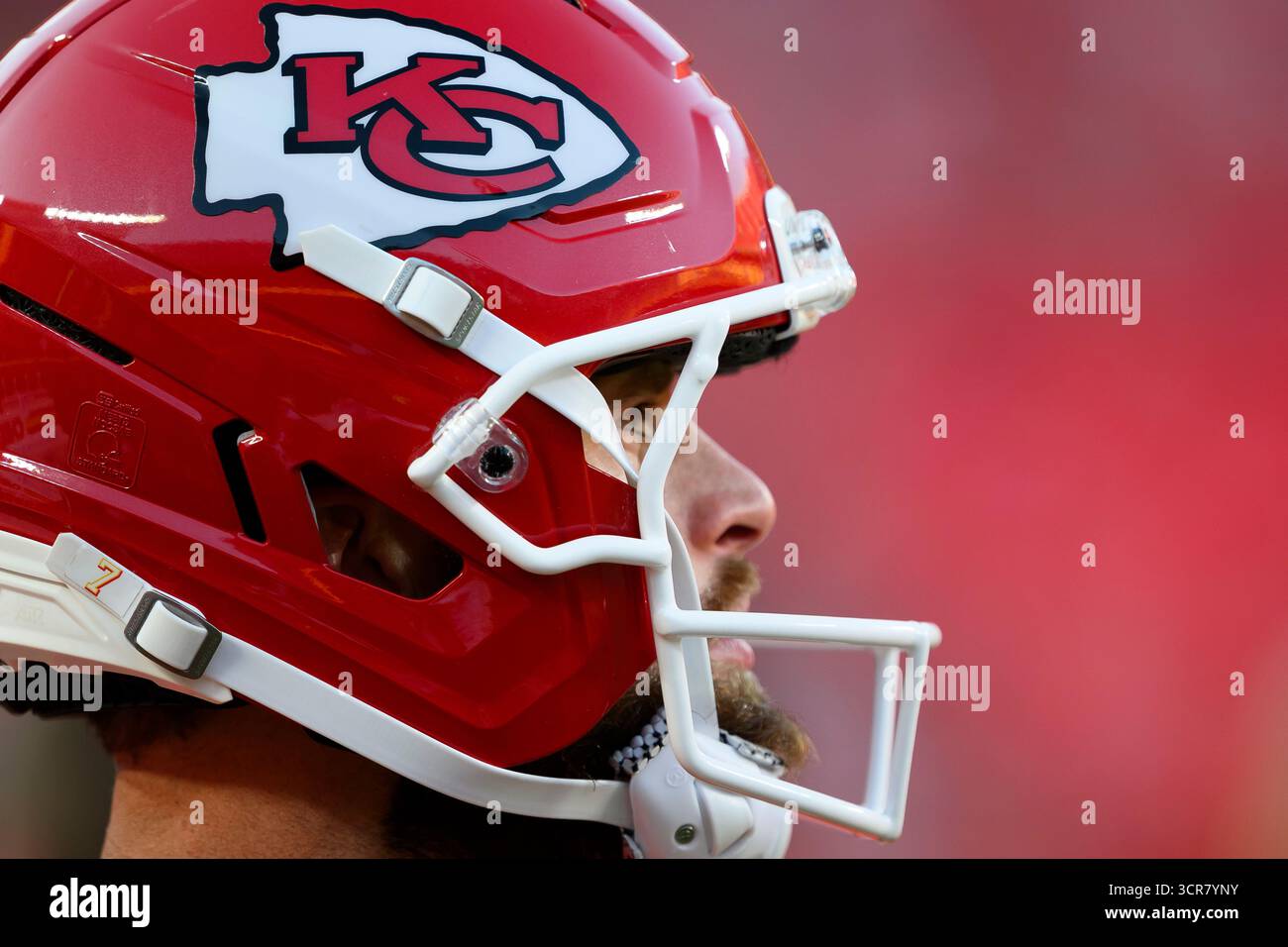 Kansas City Chiefs kicker Harrison Butker looks to the scoreboard from ...