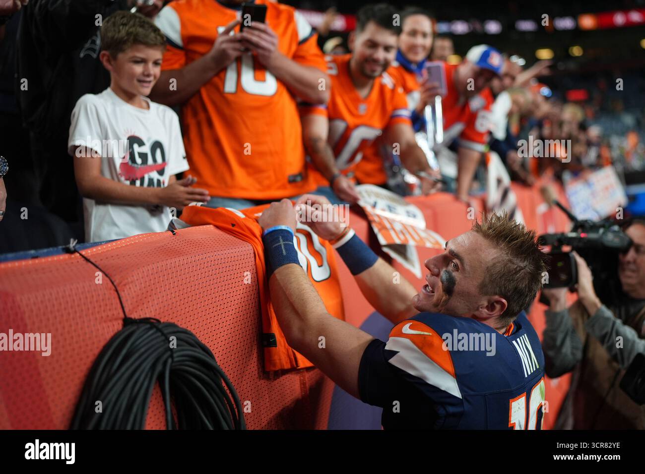 Denver Broncos quarterback Bo Nix (10) greets fans after the Denver ...
