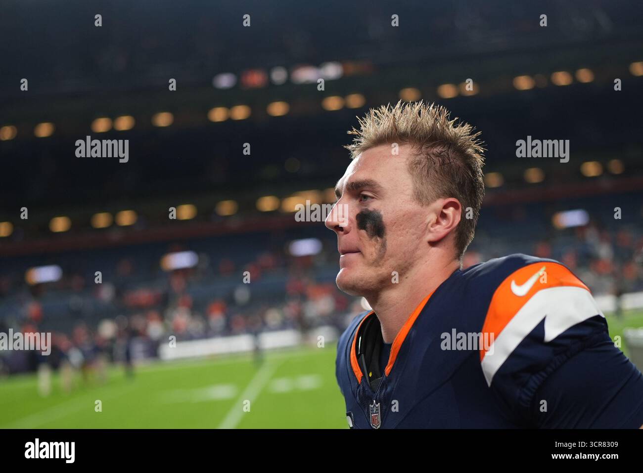 Denver Broncos quarterback Bo Nix (10) walks off the field after an NFL ...