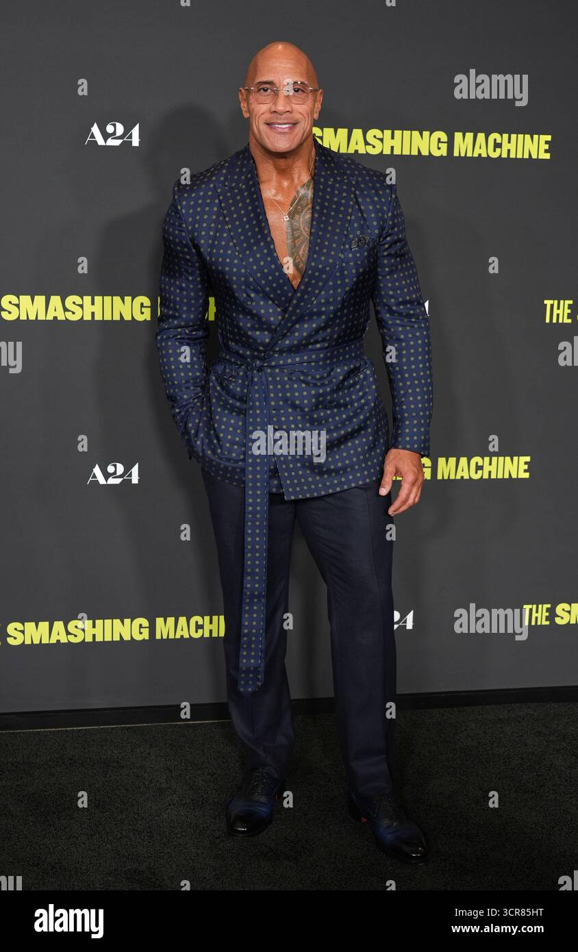 Dwayne Johnson, star of "The Smashing Machine," poses at the premiere ...