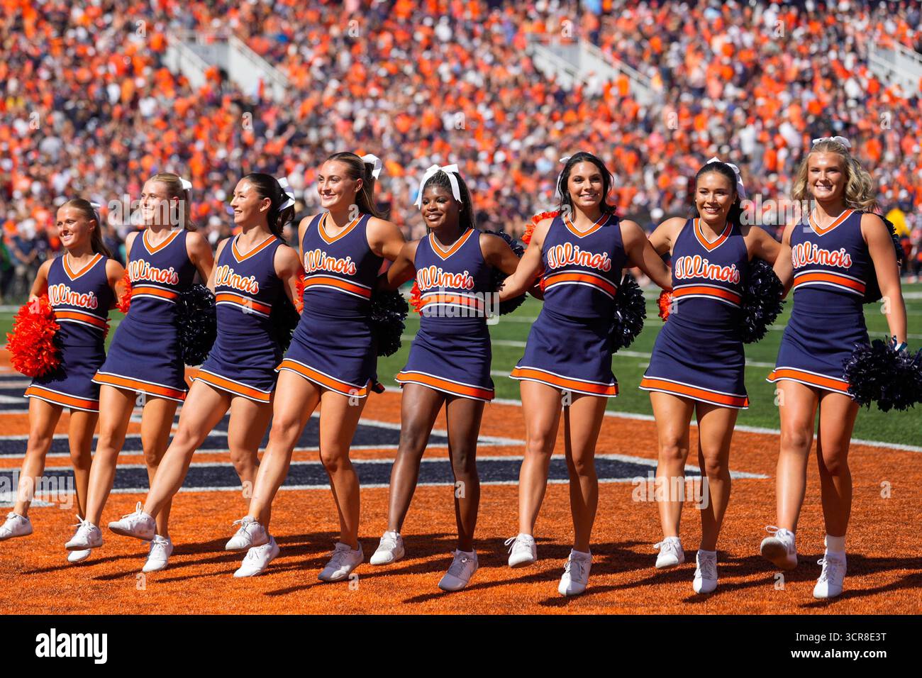 Illinois Fighting Illini cheerleaders perform during a NCAA Football ...