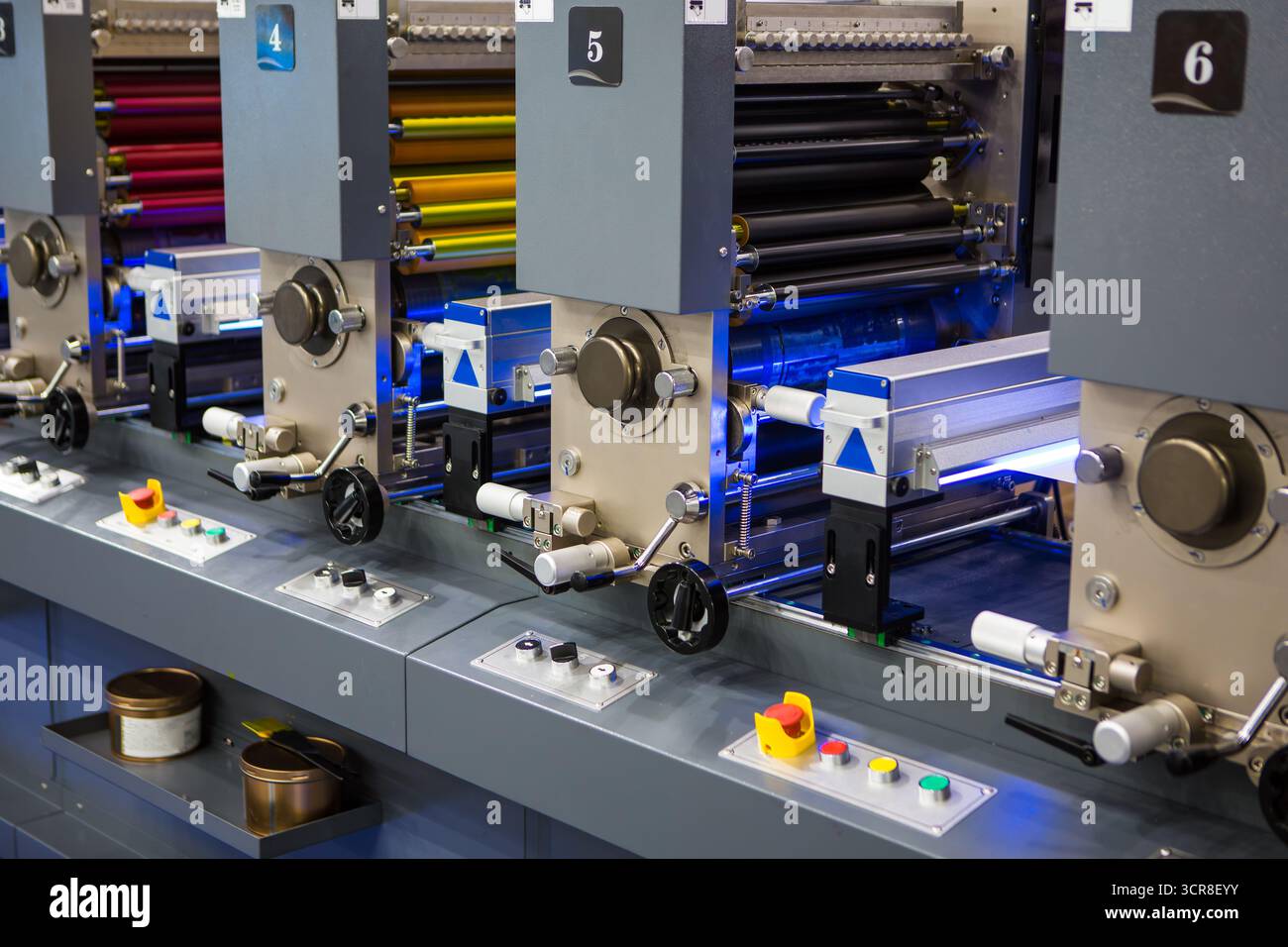 Detailed view of flexographic multi-color industrial printing press ...