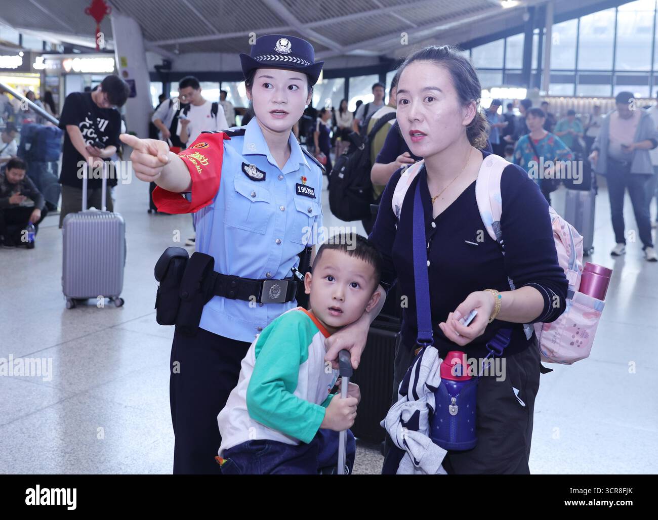 Passengers are seen at Wuhan railway station in Wuhan City, central ...