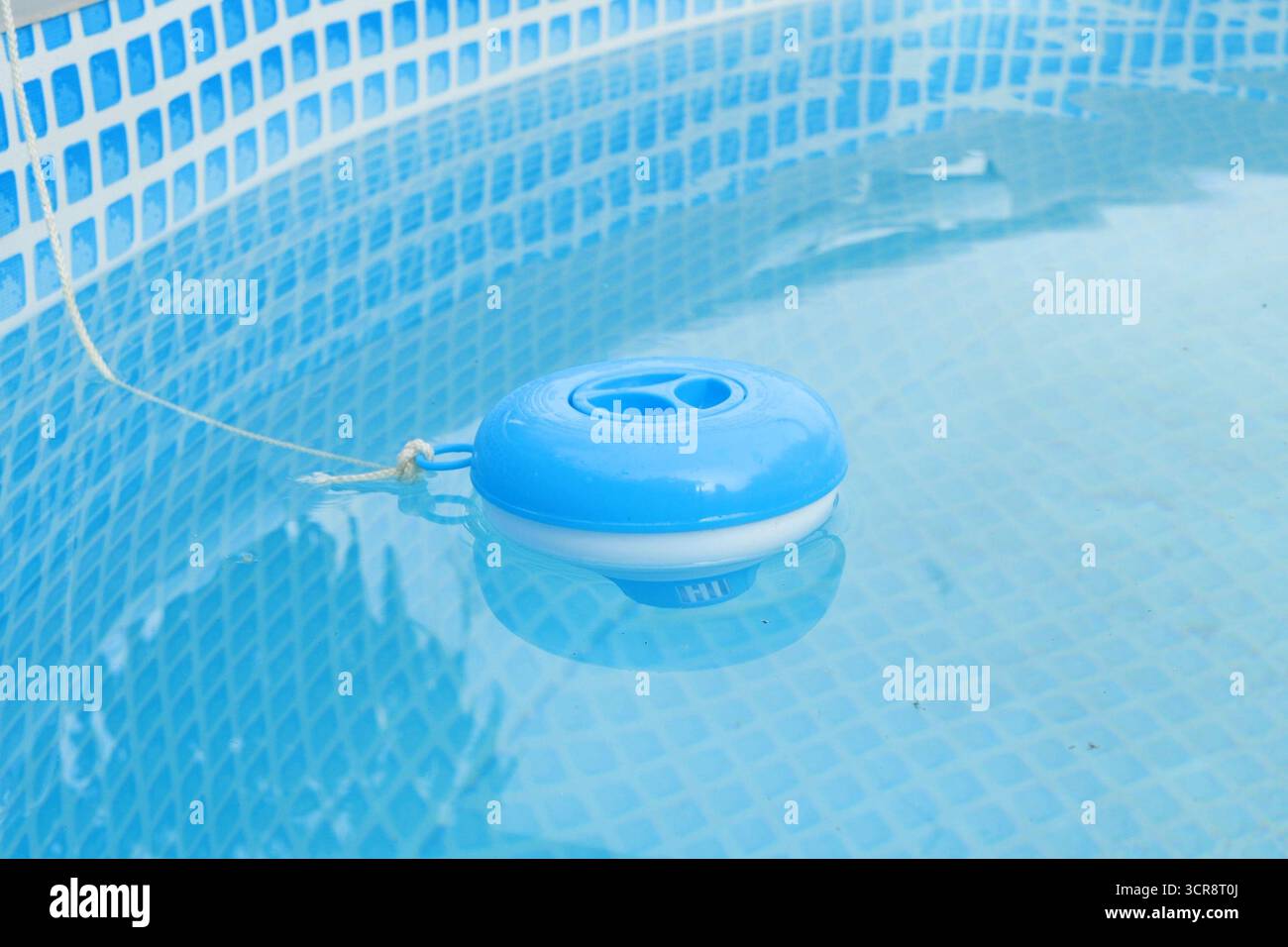 Worker hands isinfection and chlorination of water in the pool ...