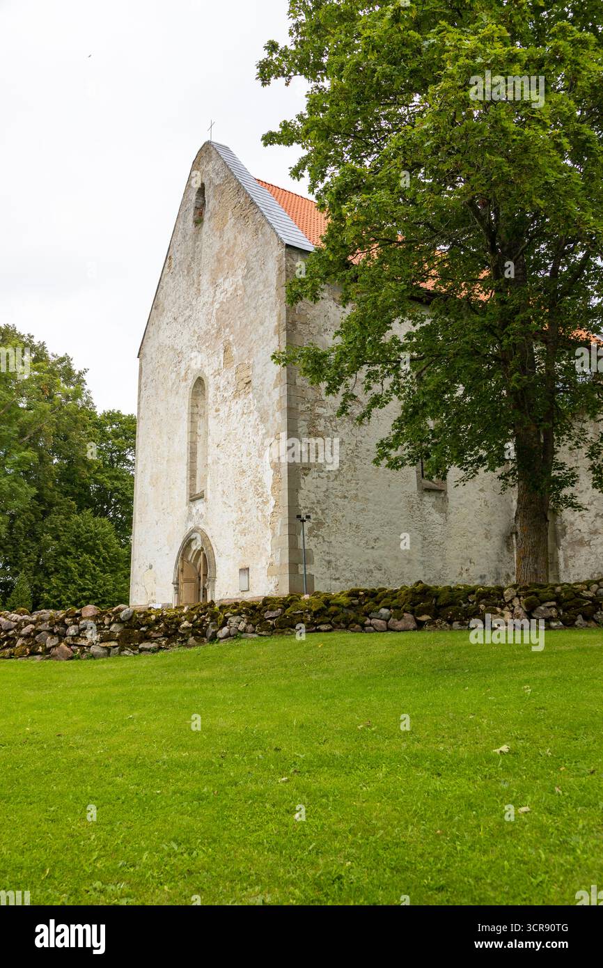 Exterior view of a medieval stone church in Saaremaa, Estonia ...