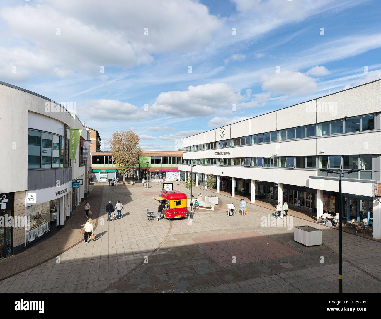 Shops and shoppers at Queen's Square in the town centre of Corby ...