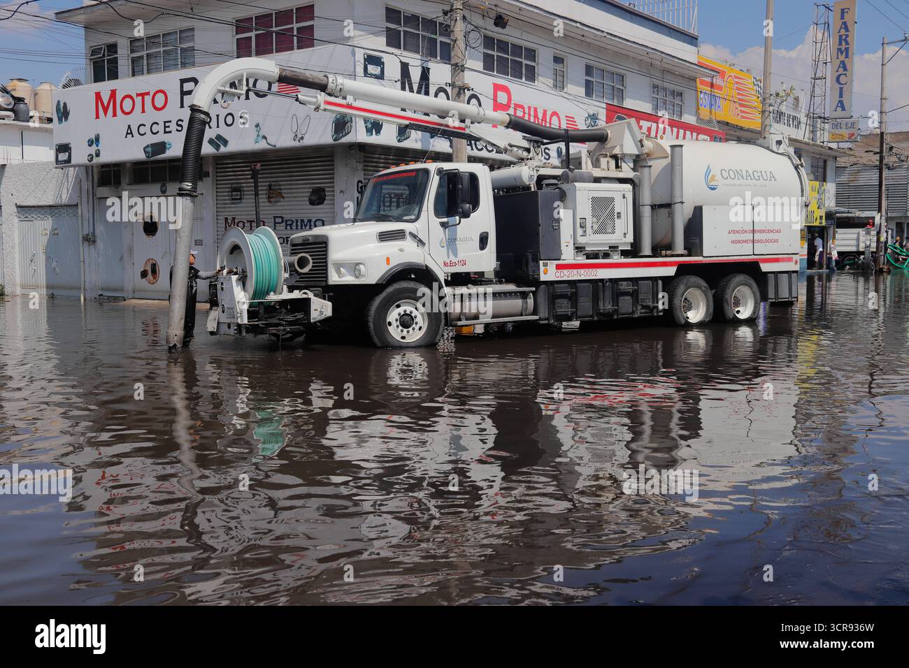 Flooding In Eastern Mexico City Due To Heavy Rains A truck dredges a ...