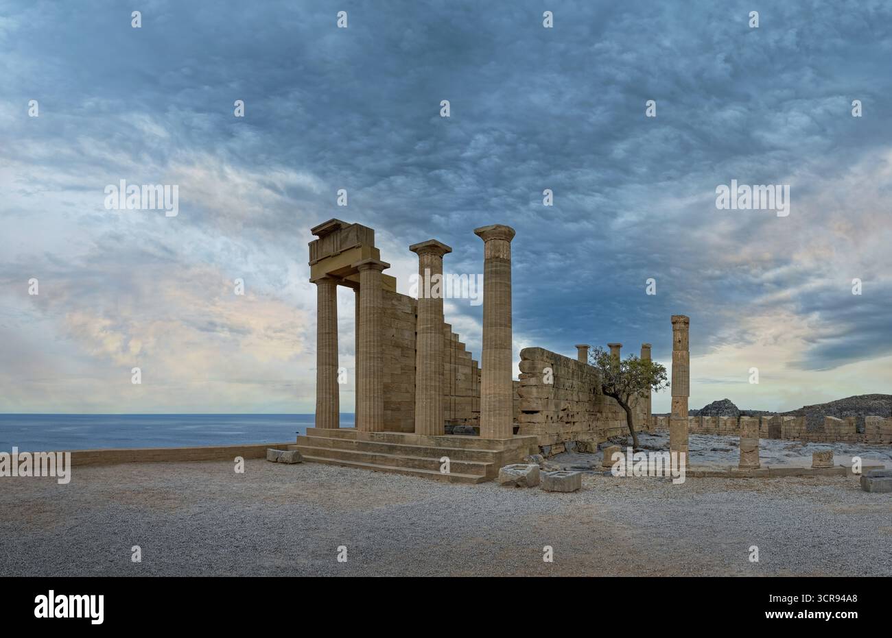Ancient ruins of the Temple of Athena on the Acropolis of Lindos with ...