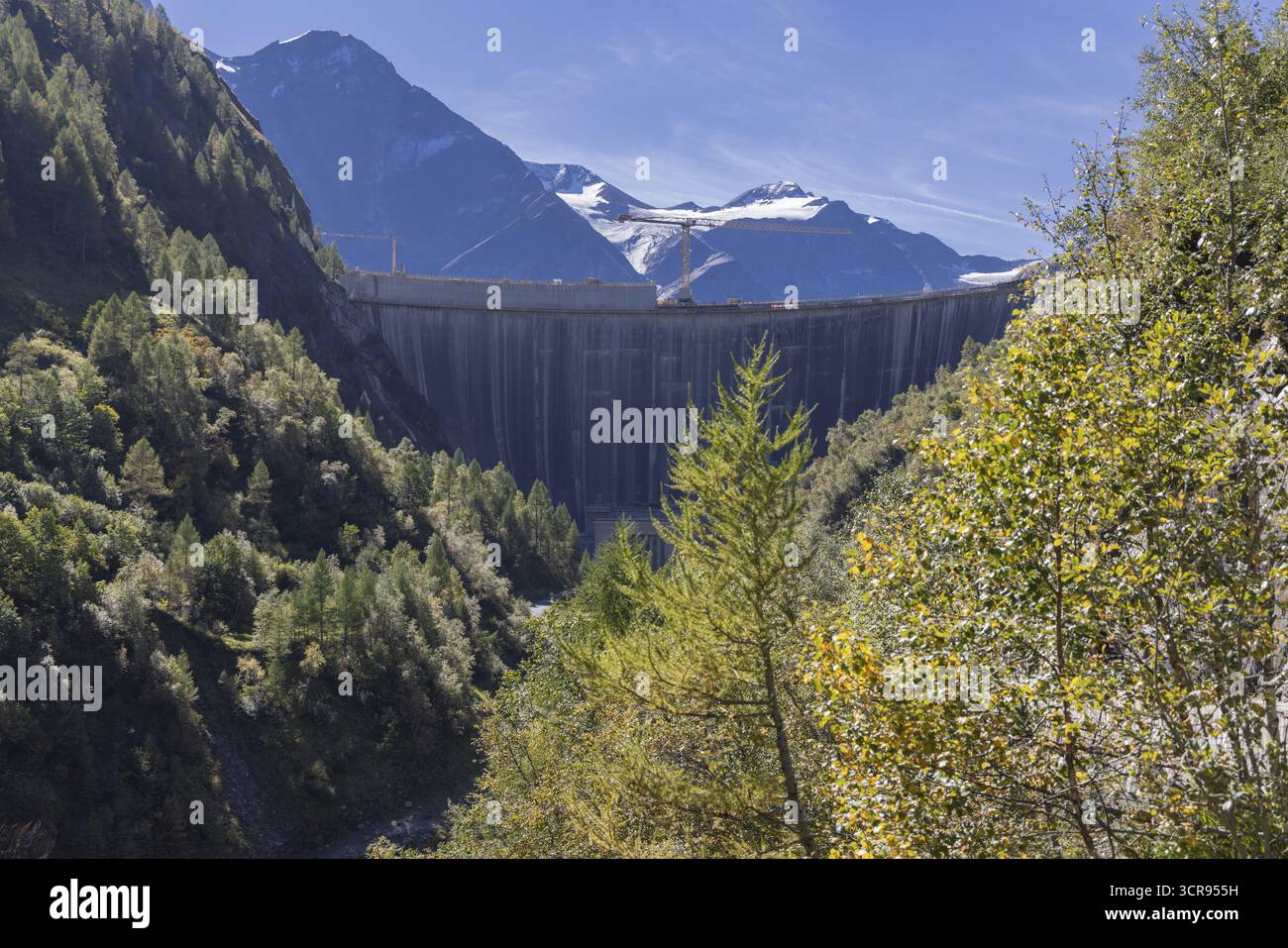 Waterfall bottom reservoir, dam wall, construction site, mountain ...