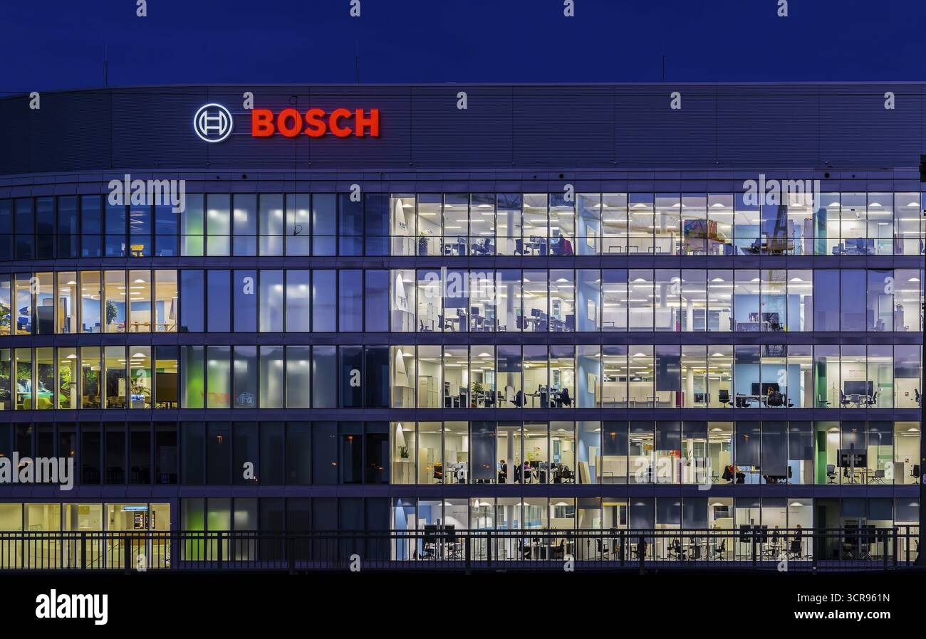 Modern office building of Bosch GmbH in Feuerbach at night with ...
