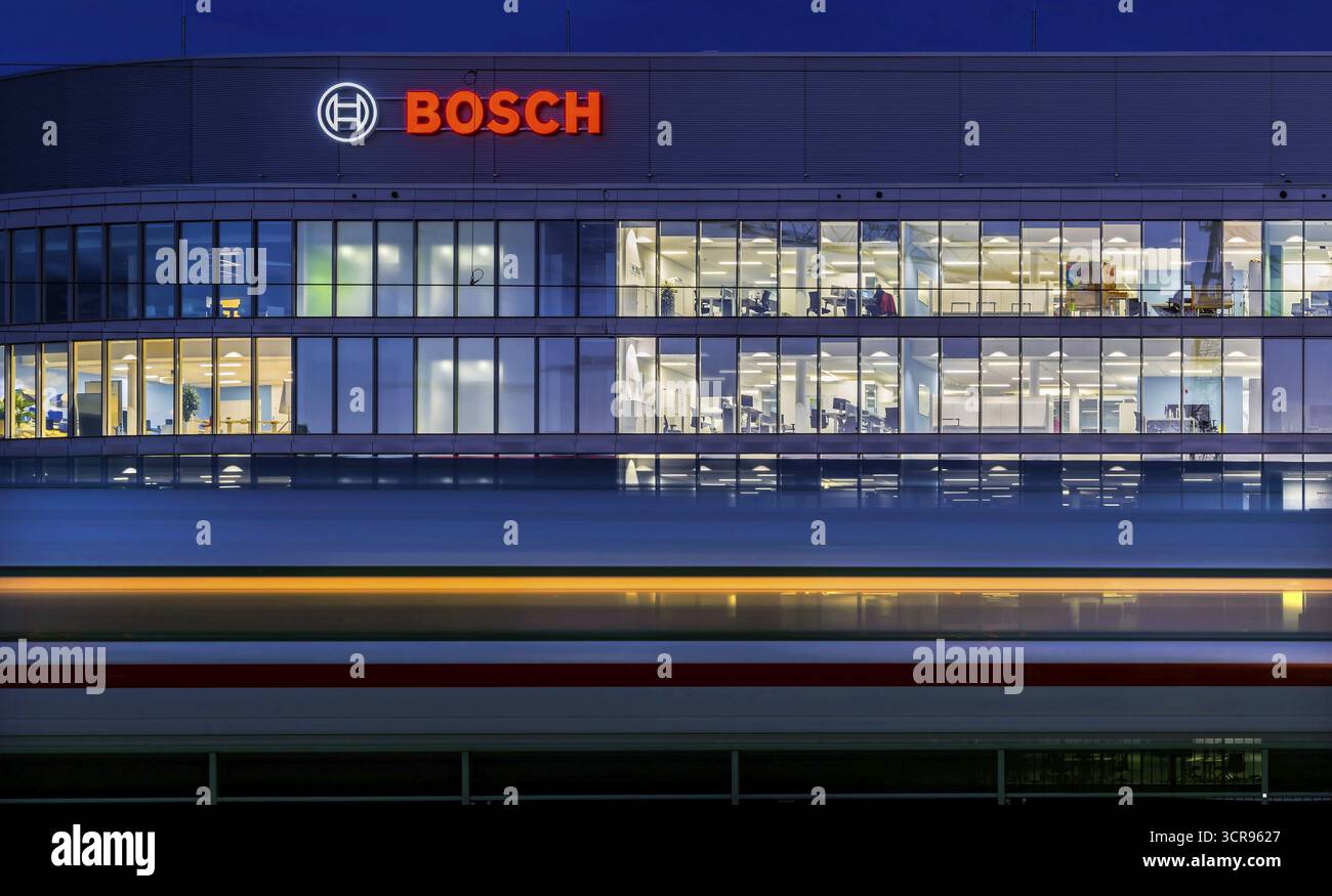 Modern office building of Bosch GmbH in Feuerbach at night with ...