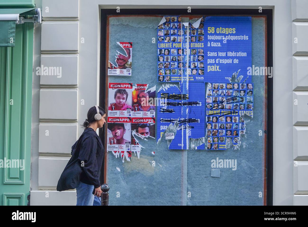 29 September 2025. A defaced poster of Israeli hostages kidnapped by ...