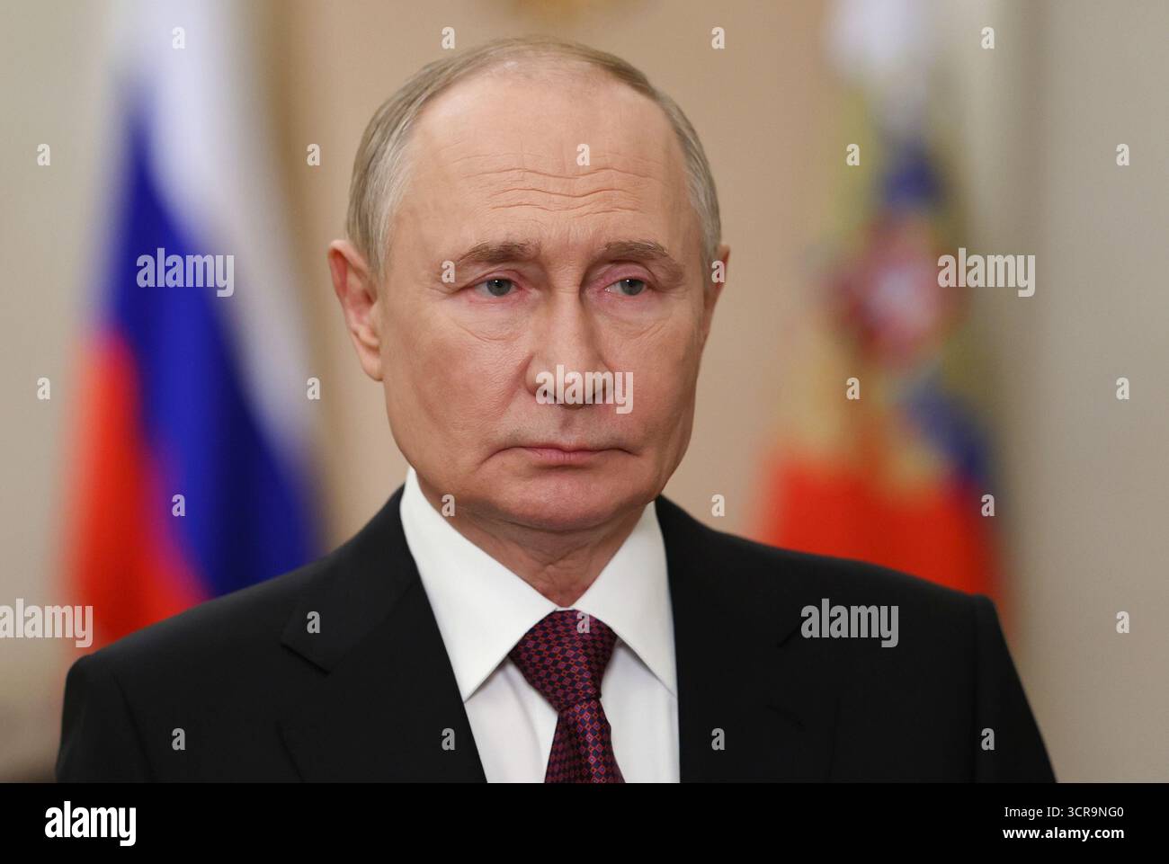 Russian President Vladimir Putin delivers a video statement on the Day ...
