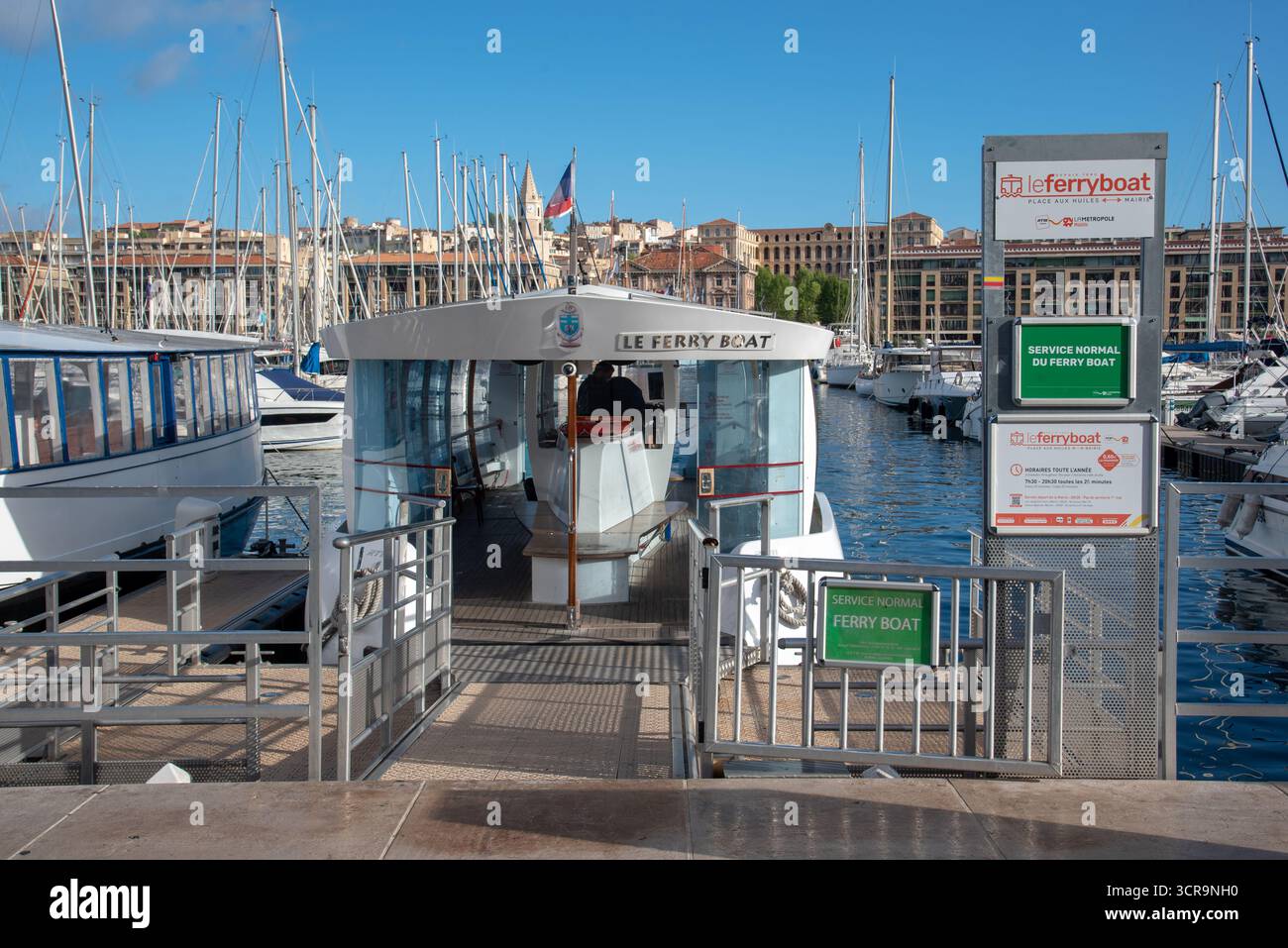 Quayside Signs for the or Le Ferry Boat Across the Old Port or Vieux ...