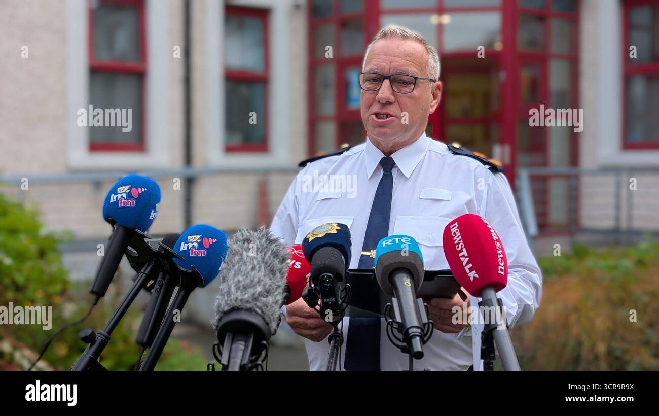 Garda Superintendent Andrew Watters speaks to the media outside ...