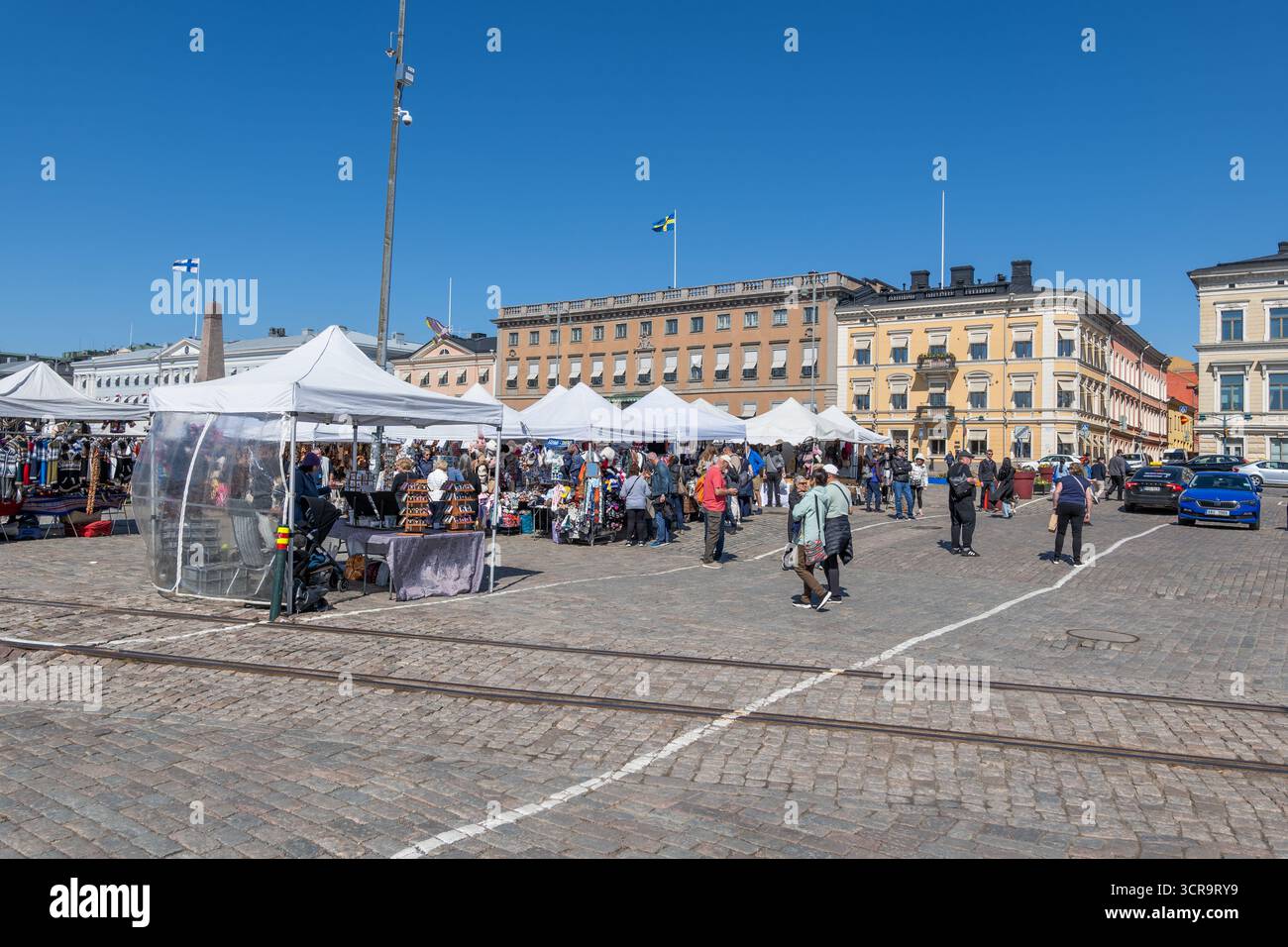 Helsinki, Finland - May 16, 2025: People shopping at the Market Square ...