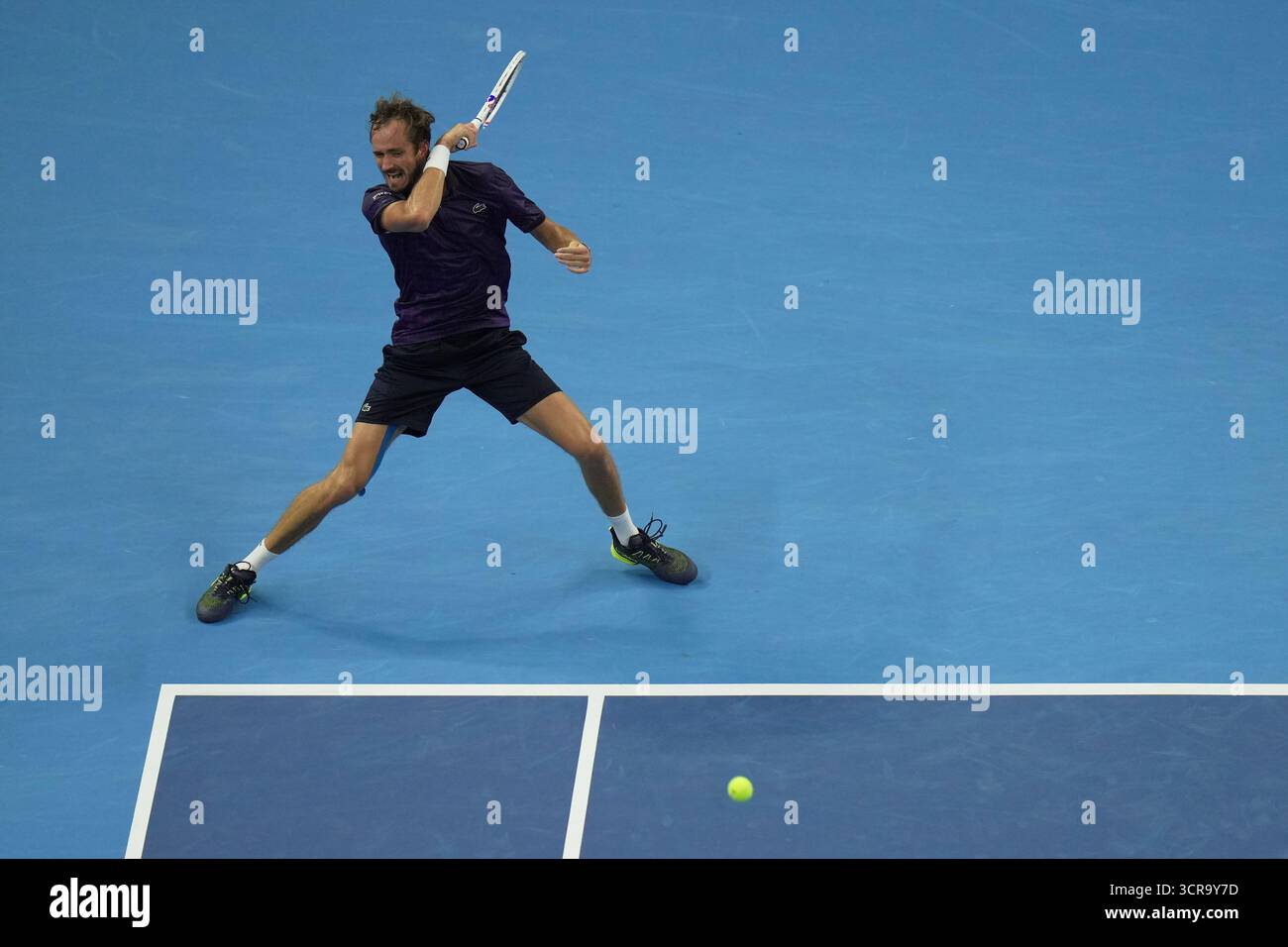 Daniil Medvedev, of Russia plays a forehand return to Learner Tien, of ...