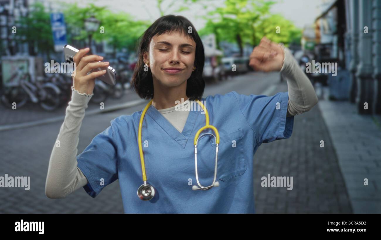 Woman clenches fist raises hi-res stock photography and images - Alamy