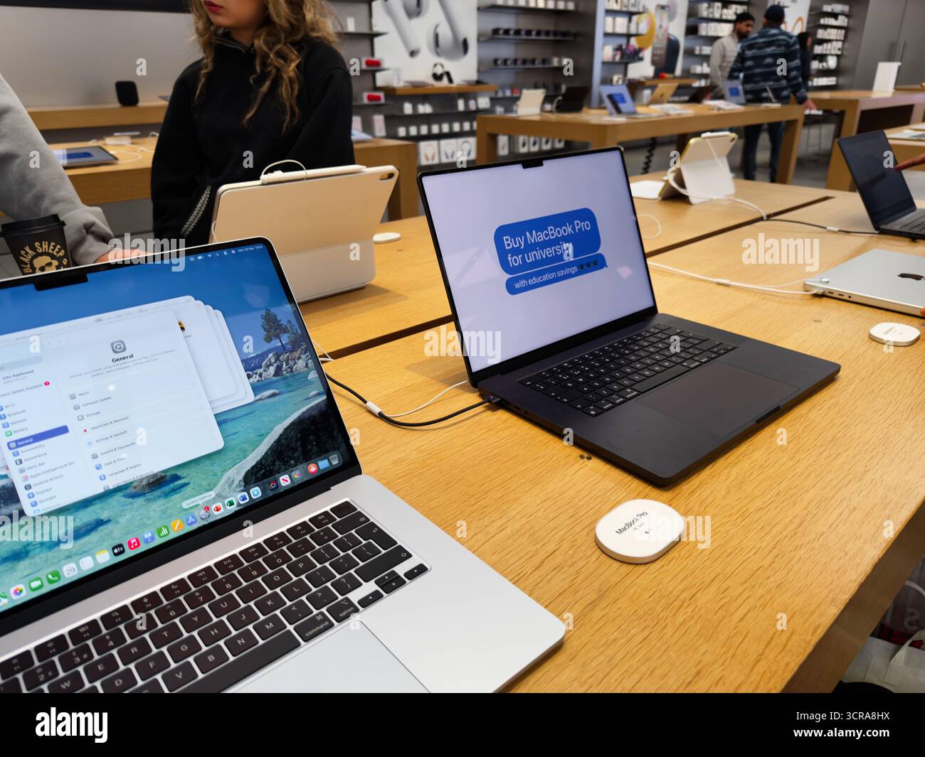 Manchester, UK - September 29, 2025: Shoppers explore laptops in a ...