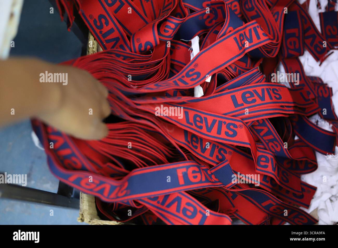 FILE - A label reading "Levis" on a pair of Levi Strauss & Co jeans is ...