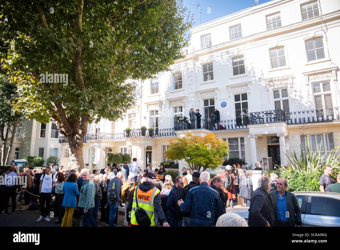 Crowds attend the unveiling of an English Heritage London Blue Plaque ...