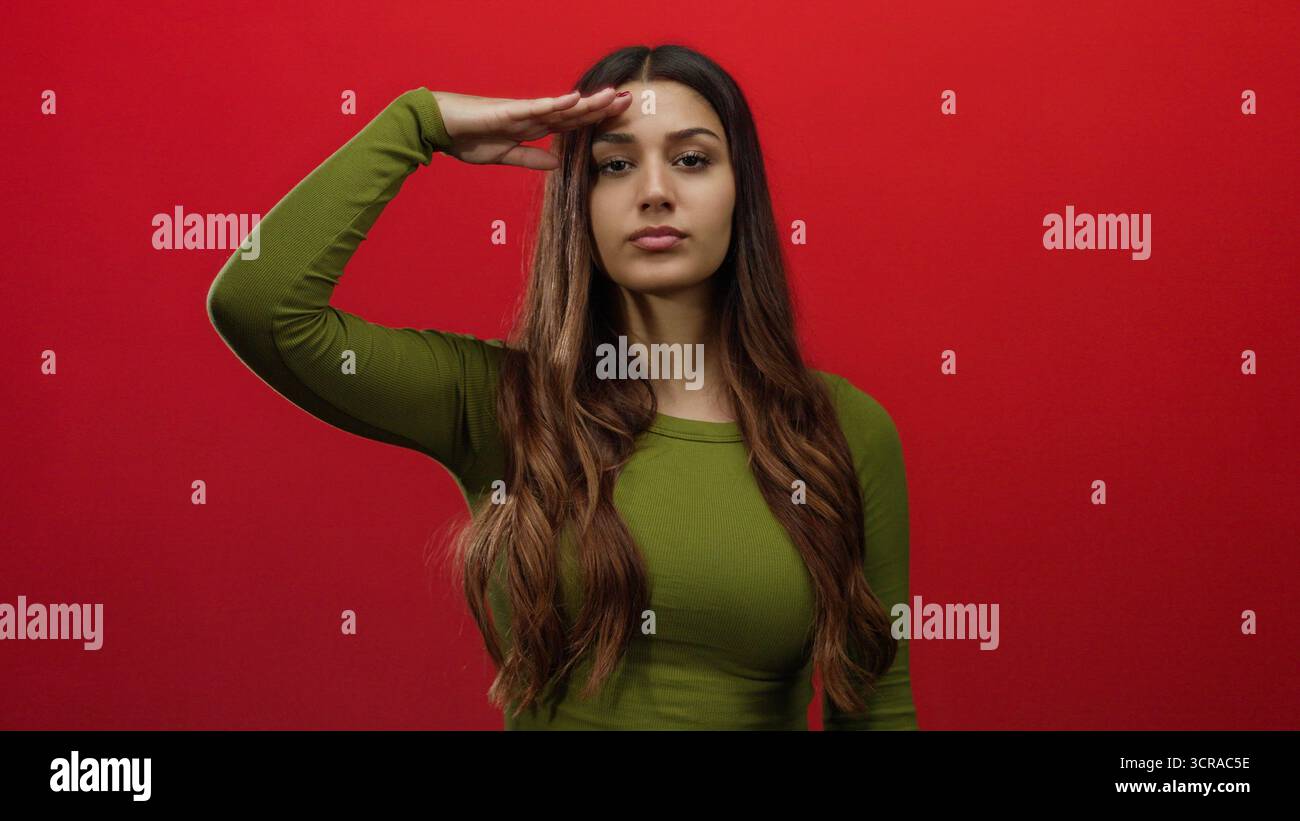Woman saluting confidently in hi-res stock photography and images - Alamy