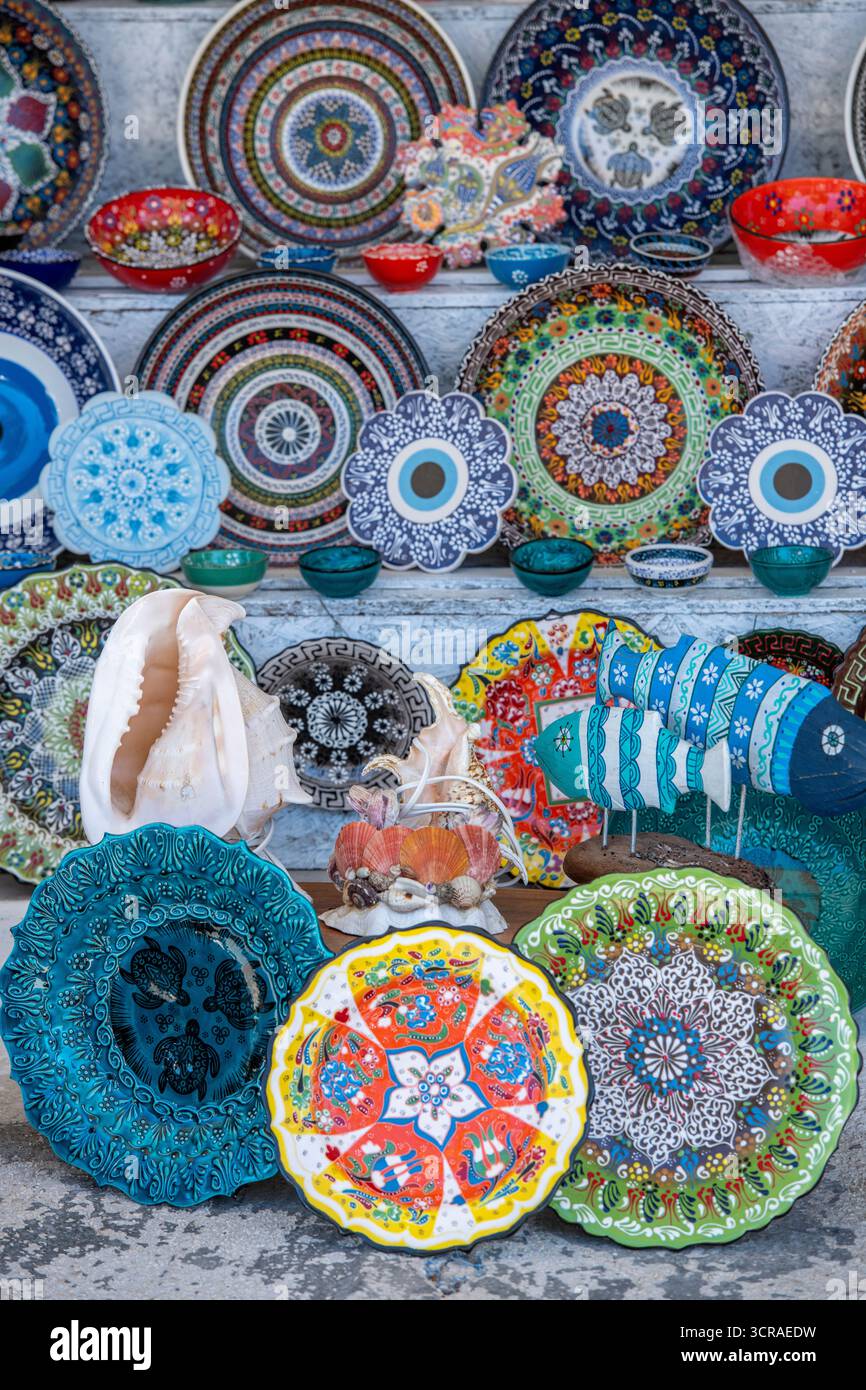 Selection of brightly coloured hand painted Greek ceramics on sale at a ...