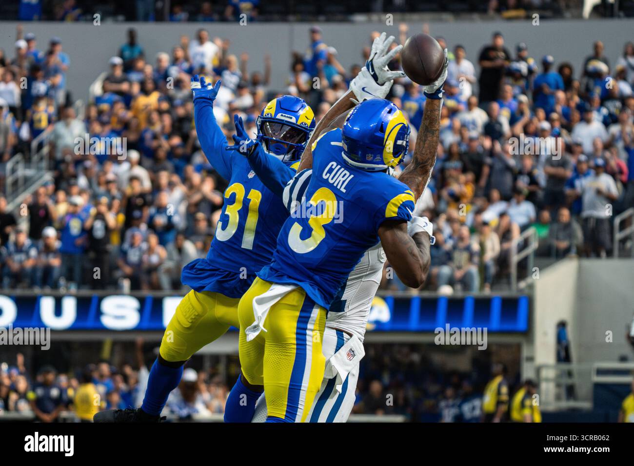 Los Angeles Rams safety Kam Curl (3) breaks up a pass during a NFL game ...