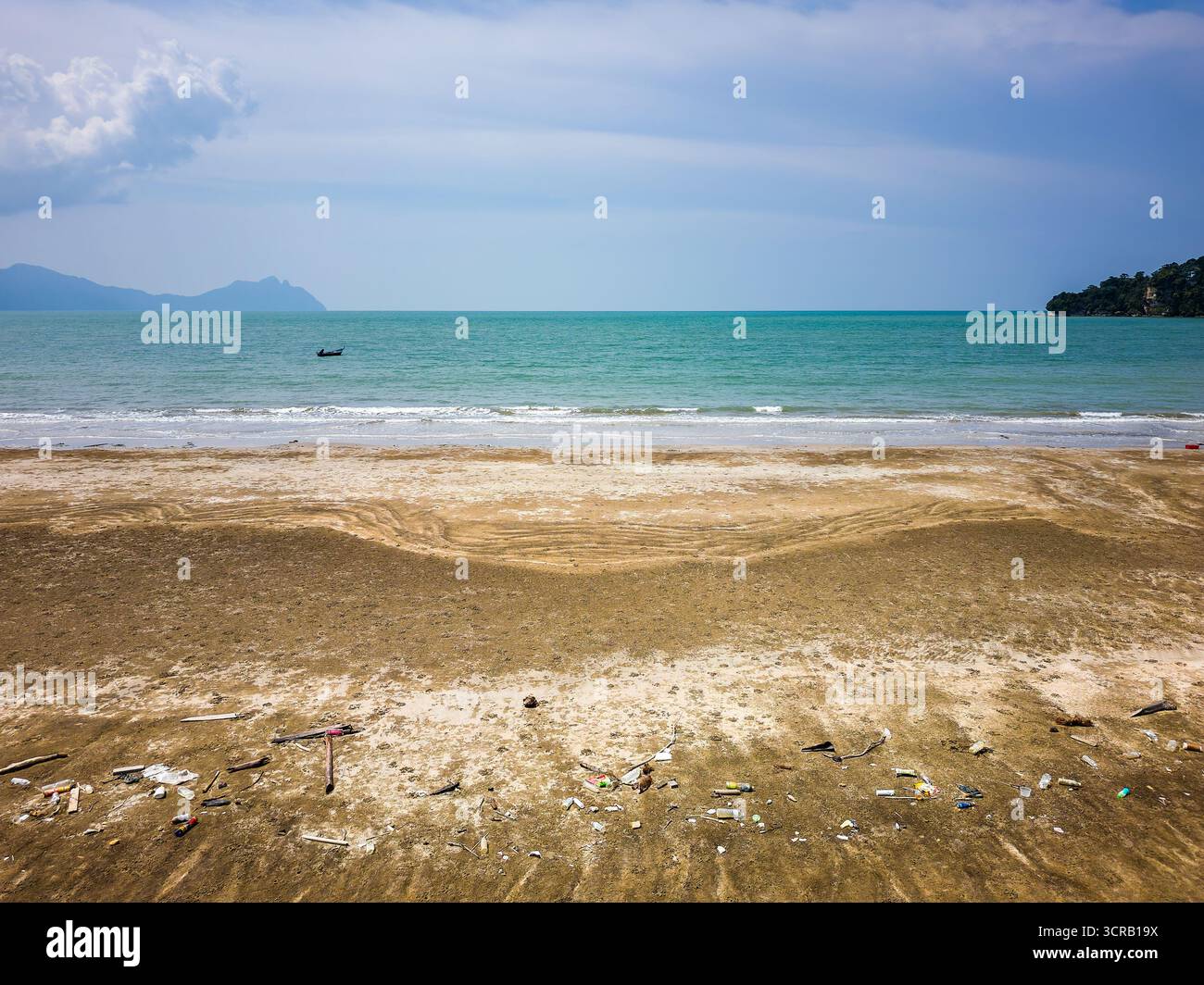 Aerial drone view of ocean pollution and waste littering a tropical ...
