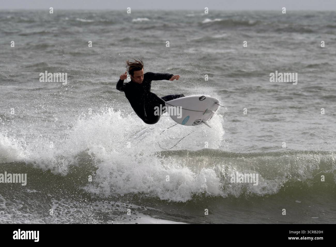 Surfing in Wales, top surfer Patrick Langdon-Dark going for it at his ...