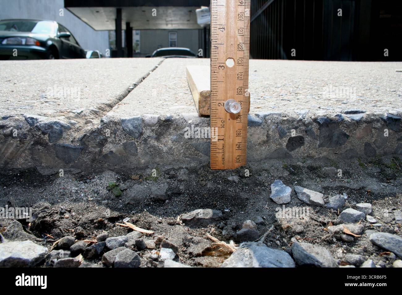 Uneven sidewalk with ruler hi-res stock photography and images - Alamy