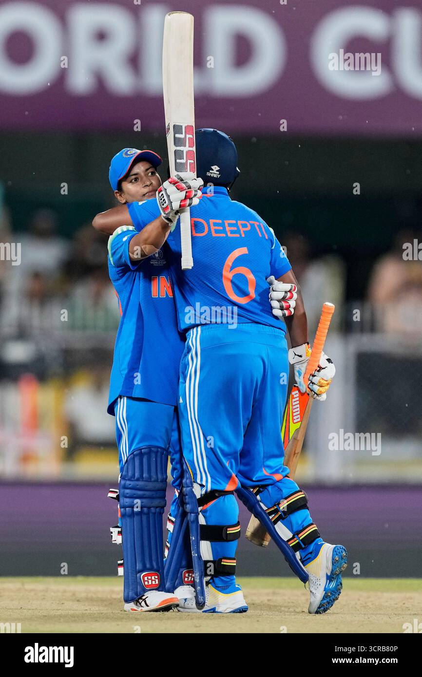 India's Amanjot Kaur celebrates her fifty runs with team mate India's ...