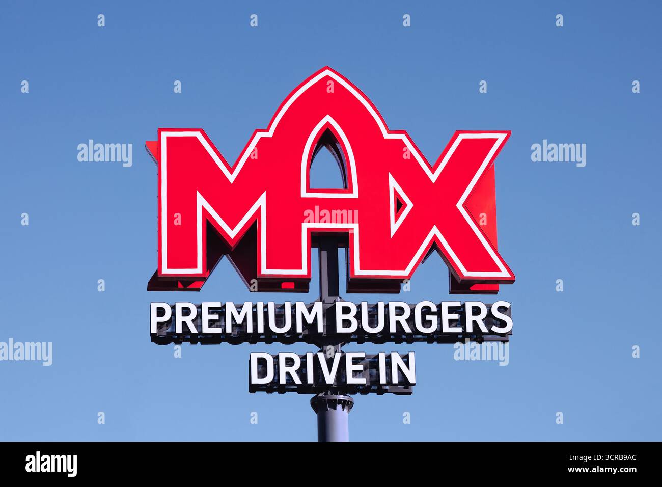 Max Burgers logo sign on a blue sky background - Max Burgers is a fast ...