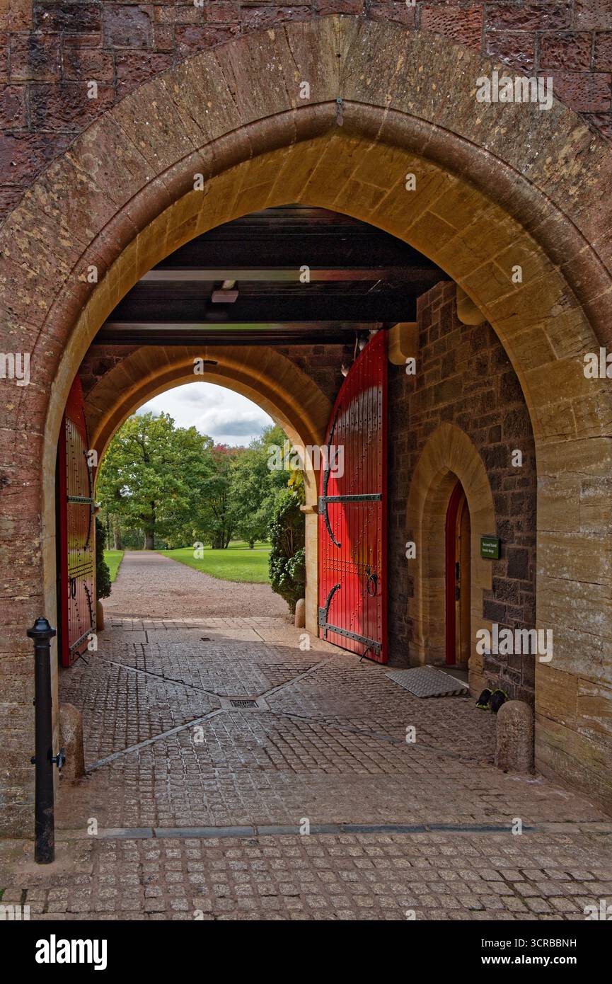 Archway looking from inside to out from an old Victorian horse stables ...