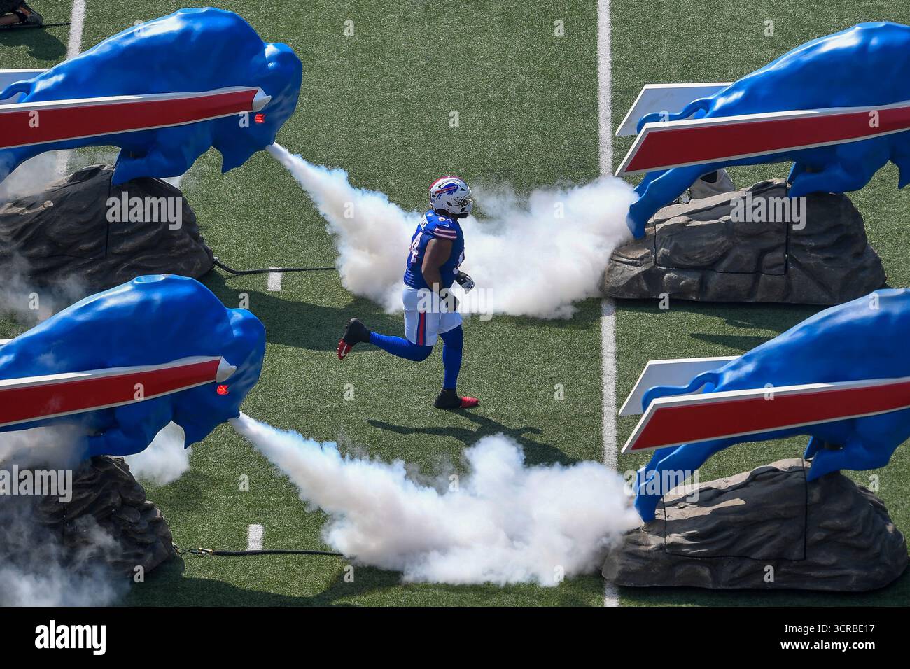 Buffalo Bills guard O'Cyrus Torrence (64) runs out for introductions ...