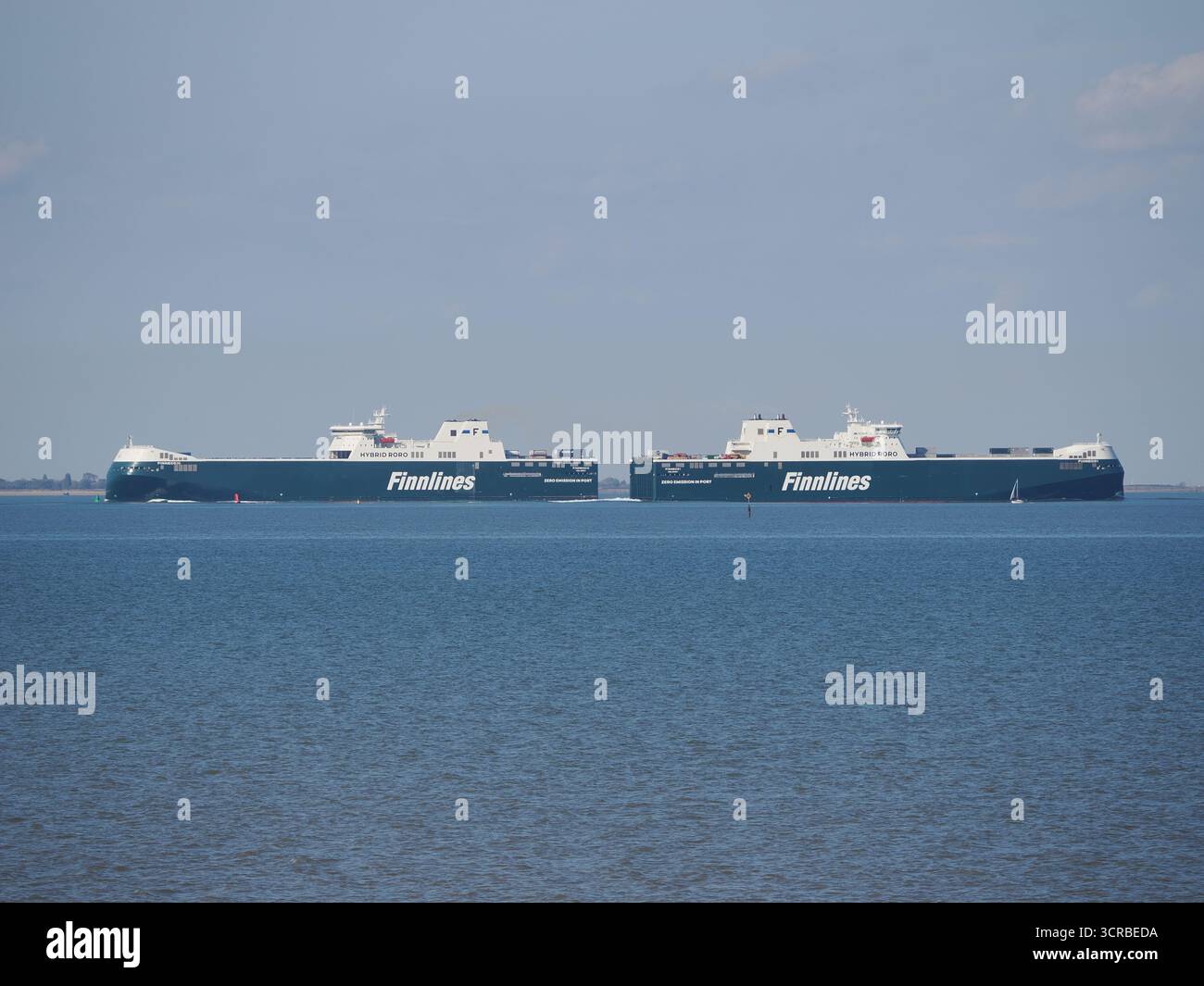 Sheerness, Kent, UK. 30th Sep, 2025. Sister Finnlines ships pass off ...