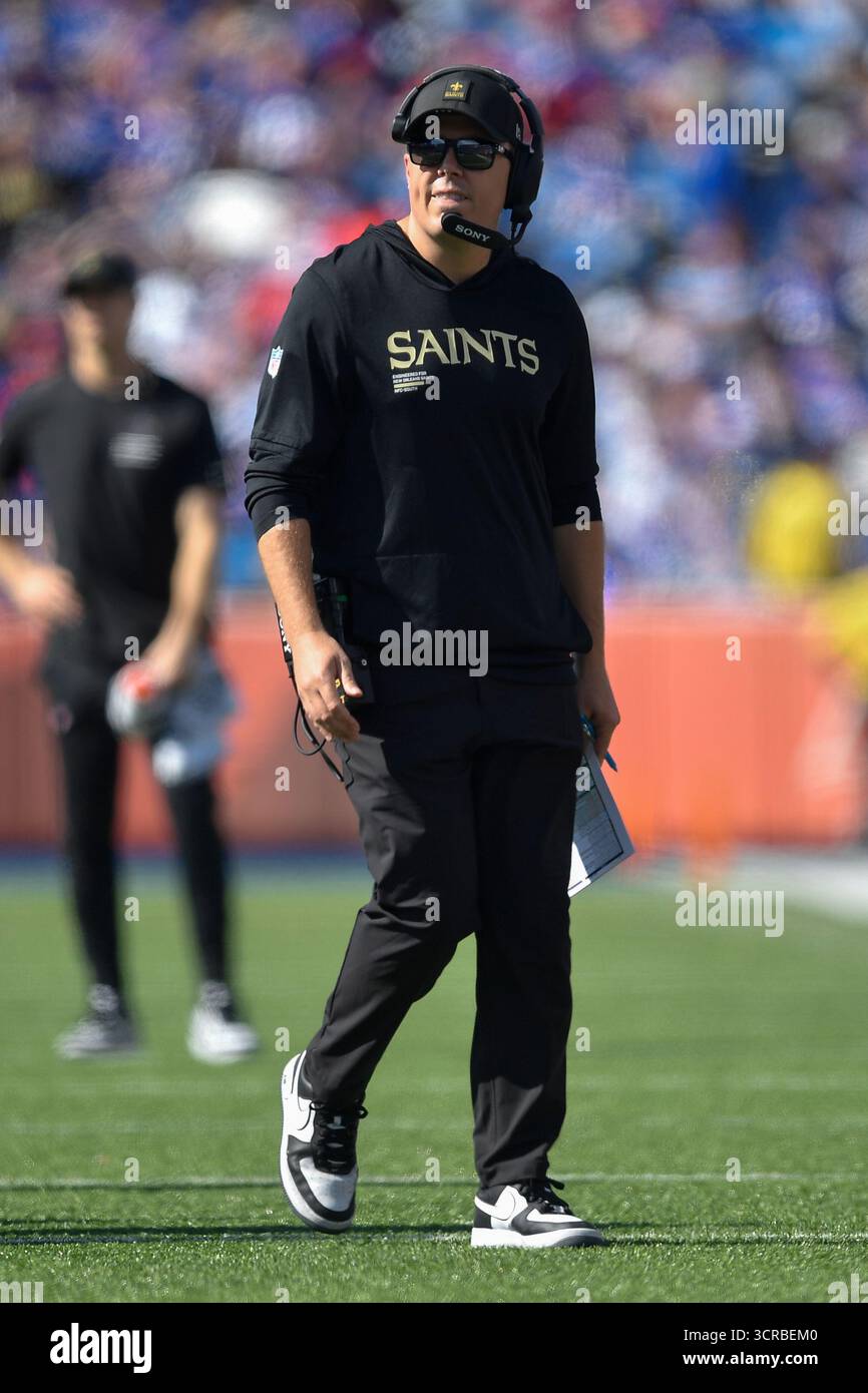 New Orleans Saints head coach Kellen Moore walks on the field during ...