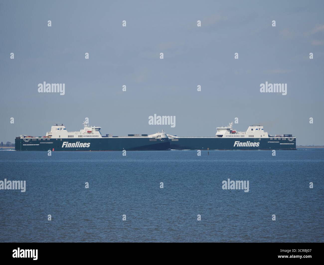 Sheerness, Kent, UK. 30th Sep, 2025. Sister Finnlines ships pass off ...