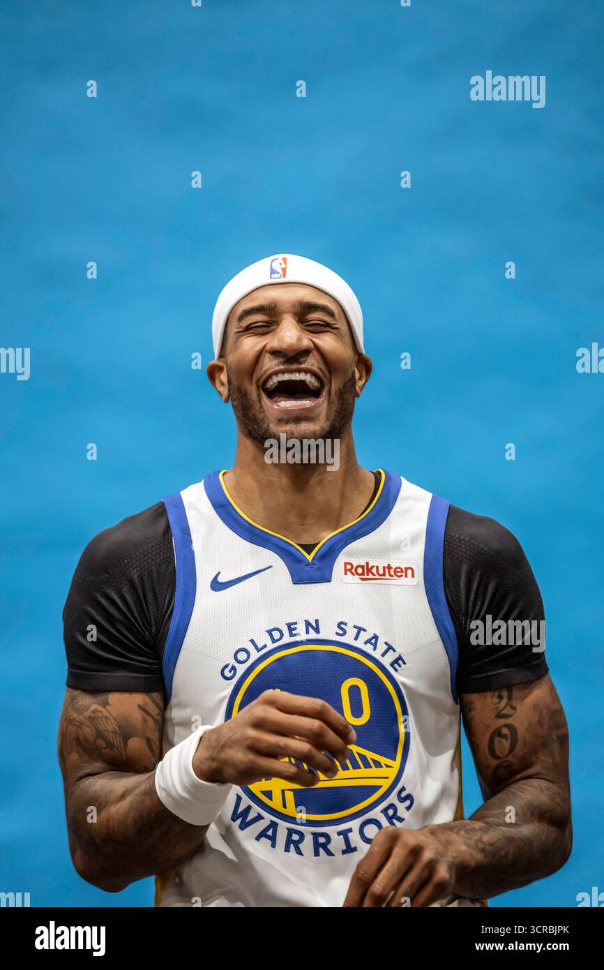 Golden State Warriors' Gary Payton II (0) breaks into laughter while ...