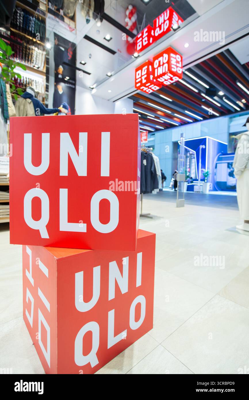 Vertical view. Uniqlo flagship retail store reopen, Singapore. Red ...