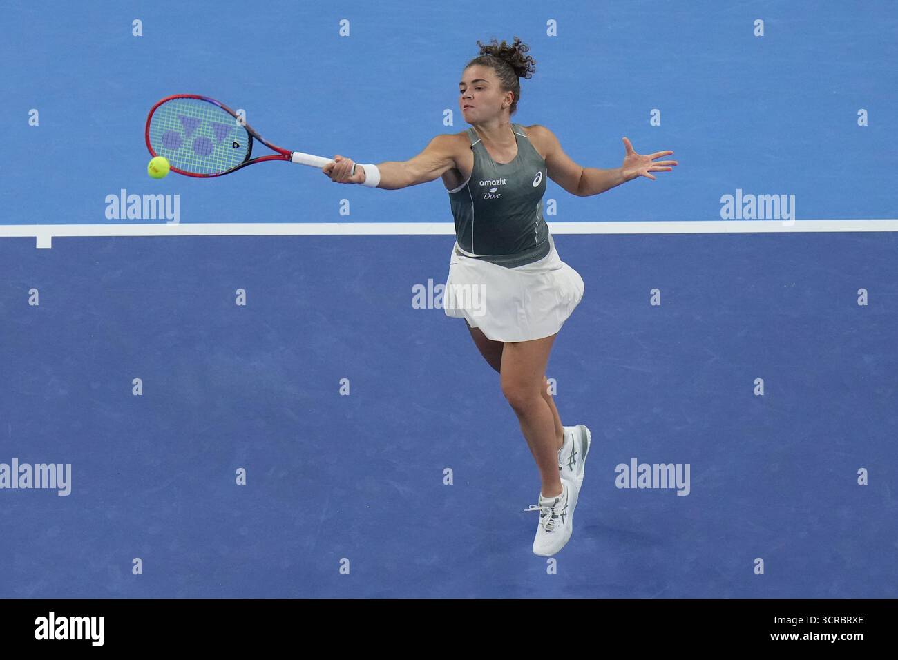 Jasmine Paolini, of Italy returns a forehand shot from Marie Bouzkova ...