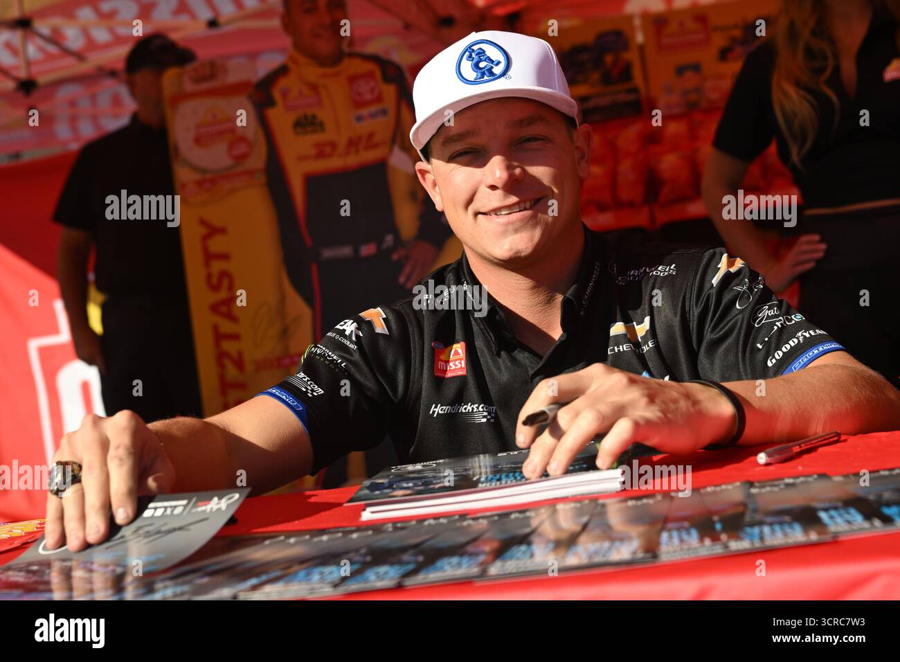 MADISON, IL - SEPTEMBER 27: Austin Prock (1) Funny Car signs an ...