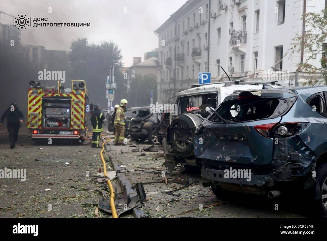 In this photo provided by the Ukrainian Emergency Service, firefighters ...